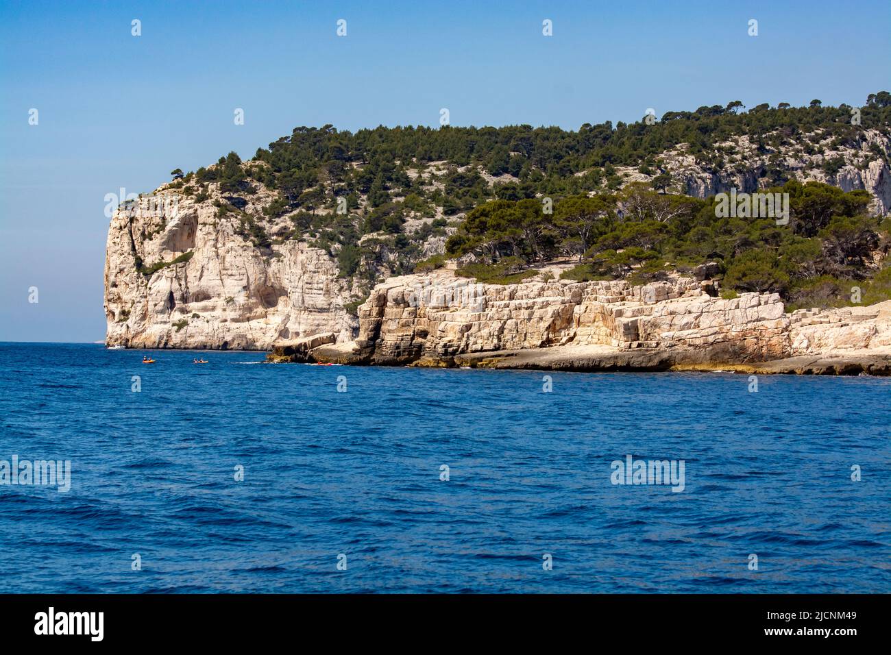 Limestone cliffs and blue sea near Cassis, boat excursion to Calanques ...