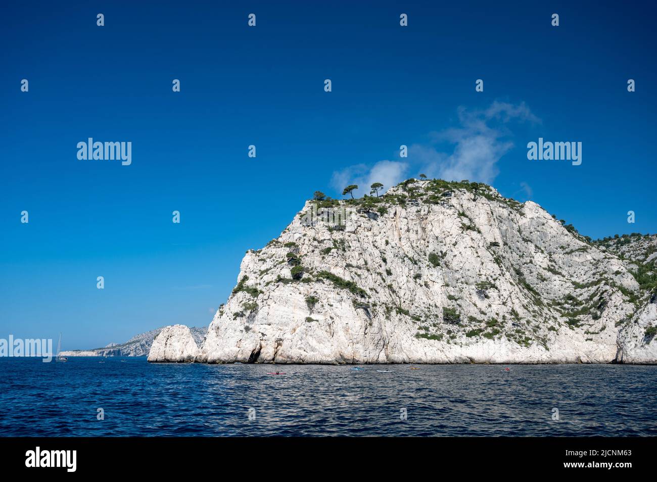 Limestone cliffs and blue sea near Cassis, boat excursion to Calanques ...