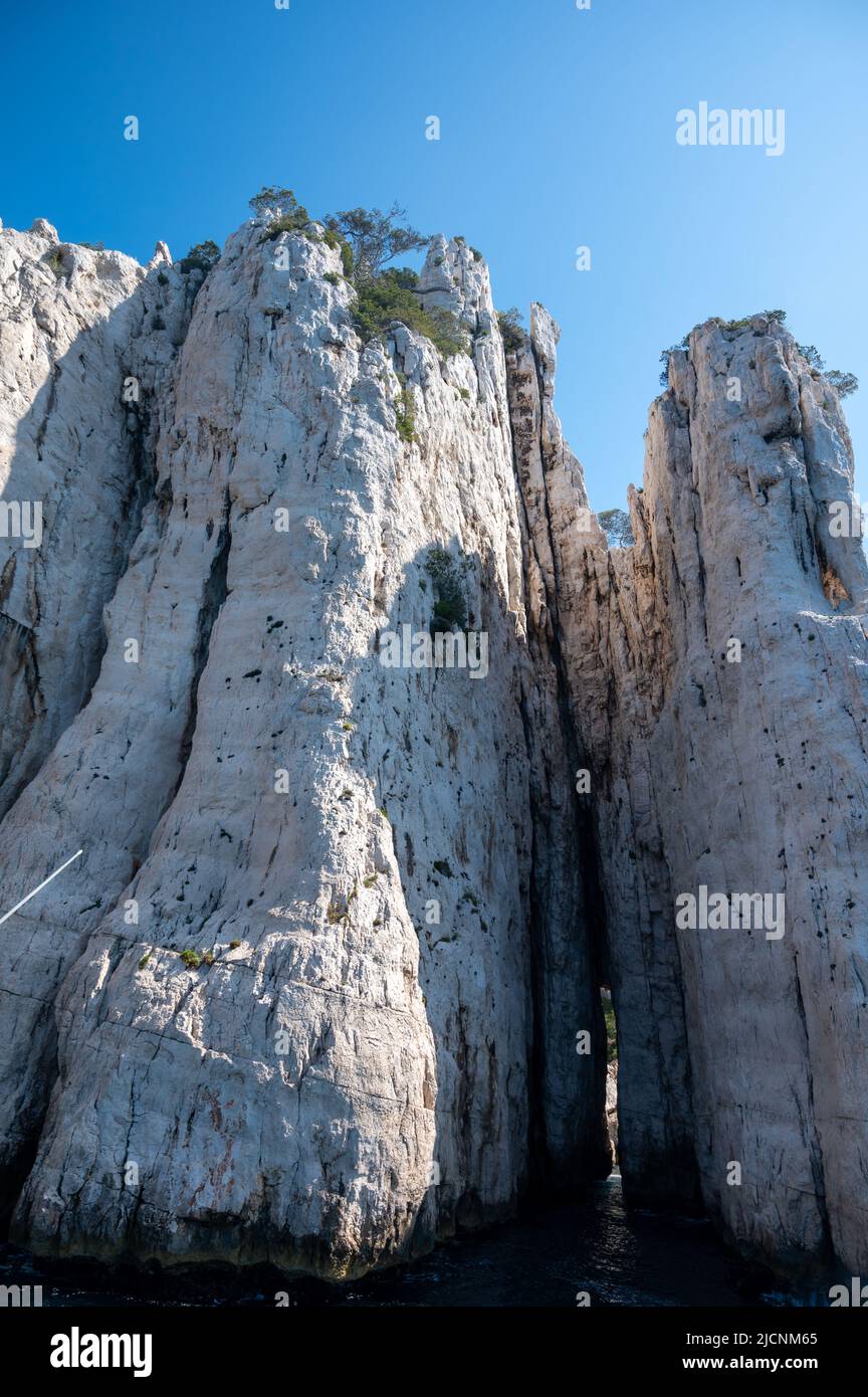 Limestone cliffs and blue sea near Cassis, boat excursion to Calanques ...