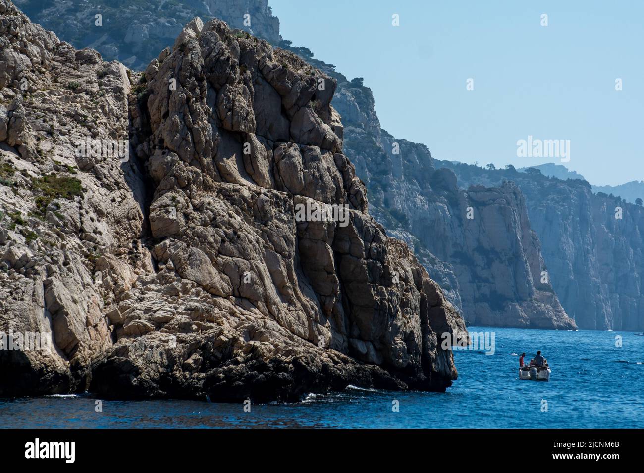 Limestone cliffs and blue sea near Cassis, boat excursion to Calanques ...
