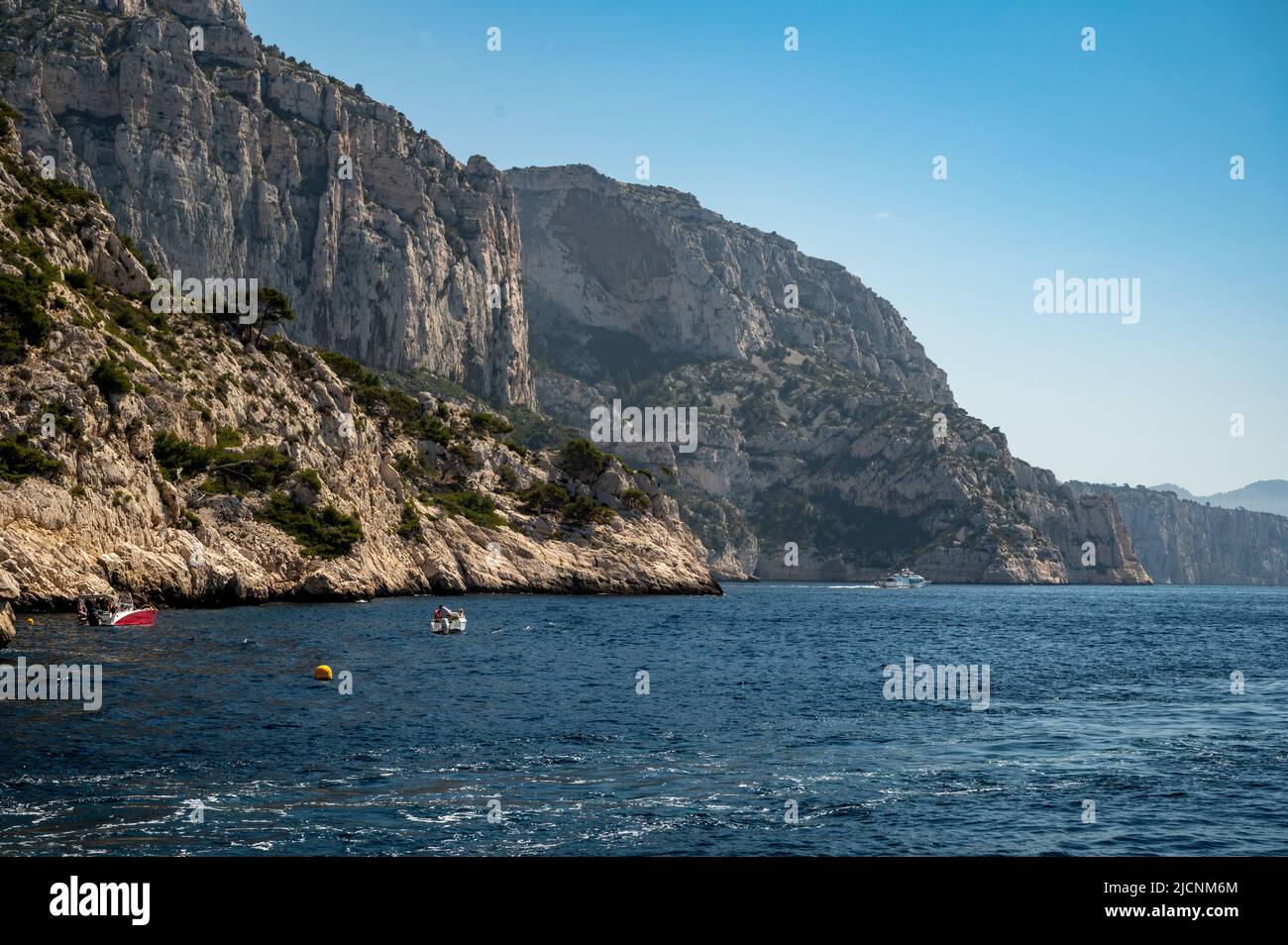 Limestone cliffs and blue sea near Cassis, boat excursion to Calanques ...