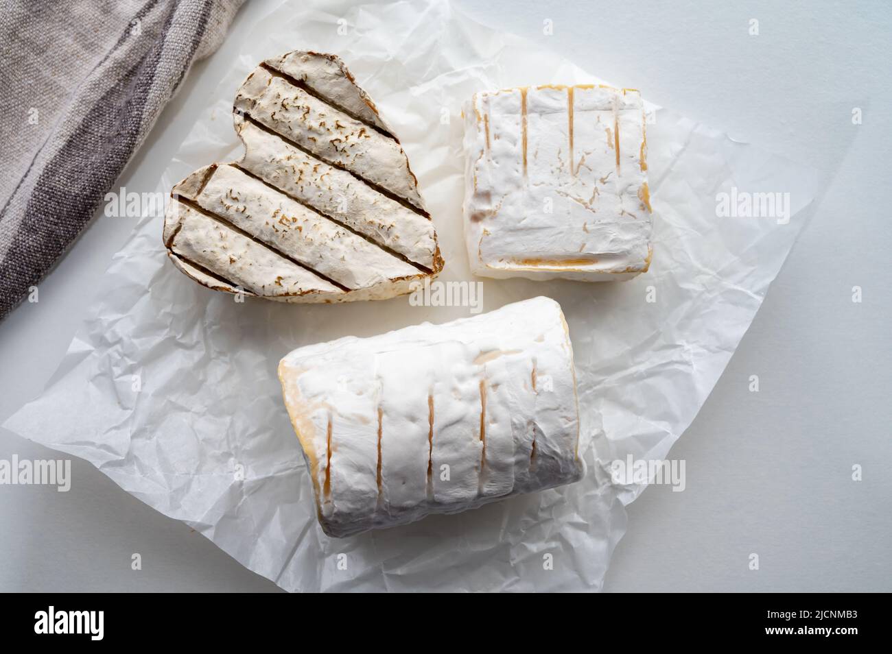 French cheeses heartshaped, squared and cylindrical neufchatel cow ...