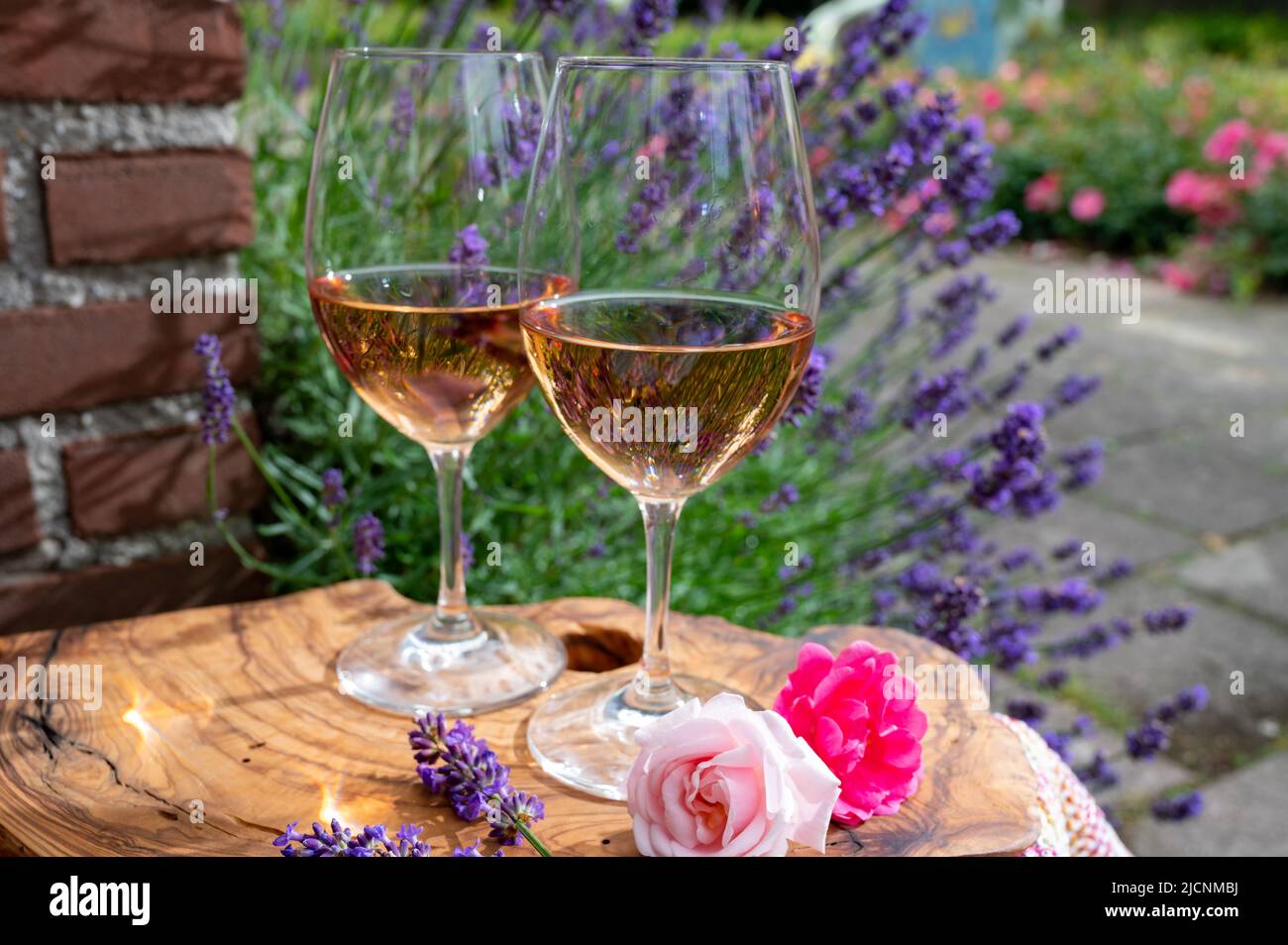 French rose wine from Provence, two glasses of wine with purple ...