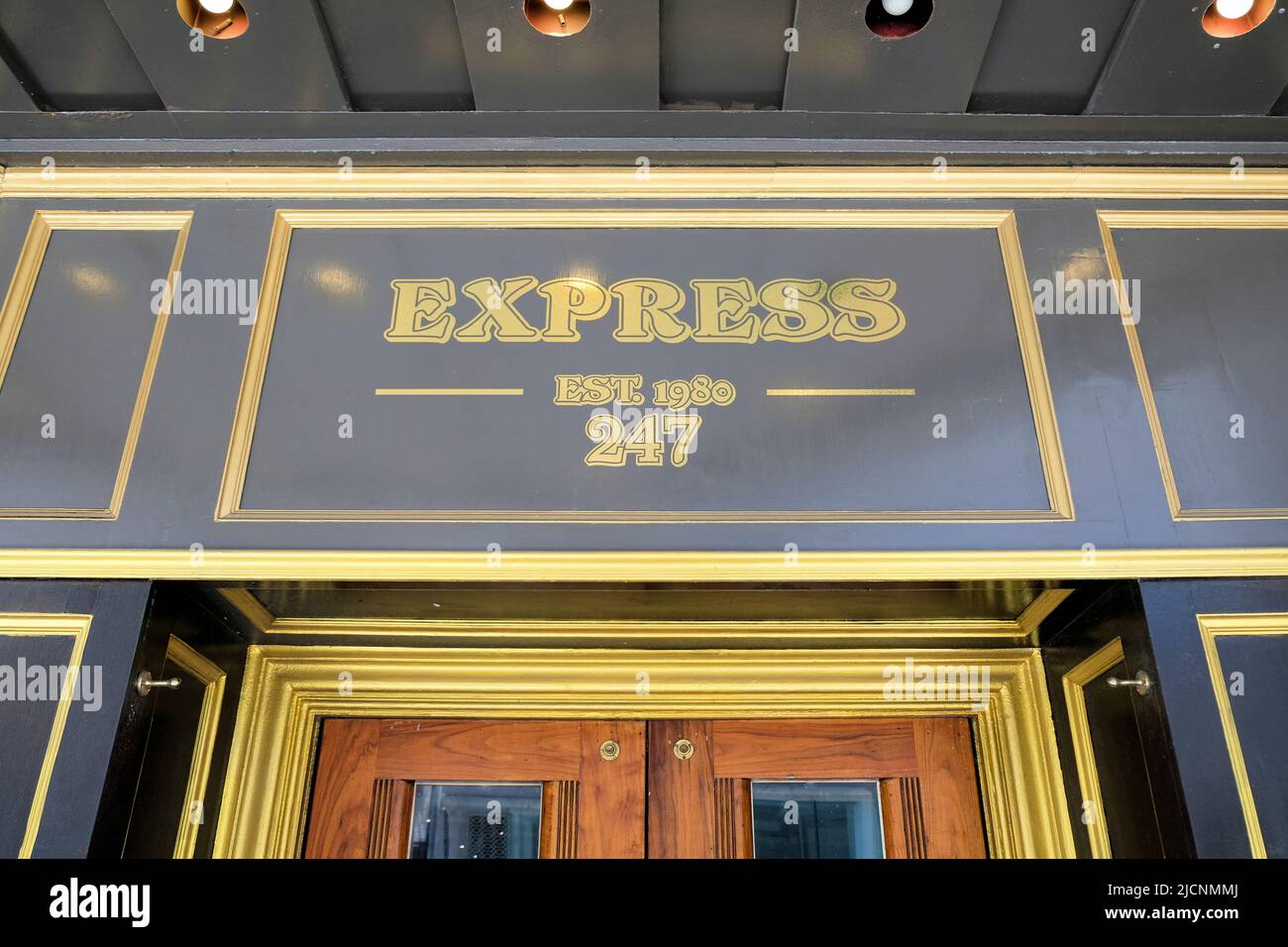 Sign above the doorway to the main entrance of the Express retail ...