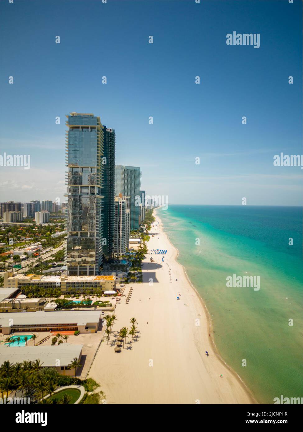Vertical aerial photo oceanfront condos Sunny Isles Beach FL Stock ...