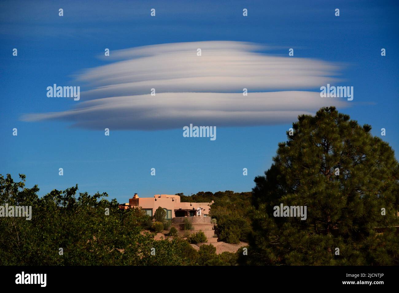 A lenticular cloud forms over the Amerian Southwest near Santa Fe, New ...