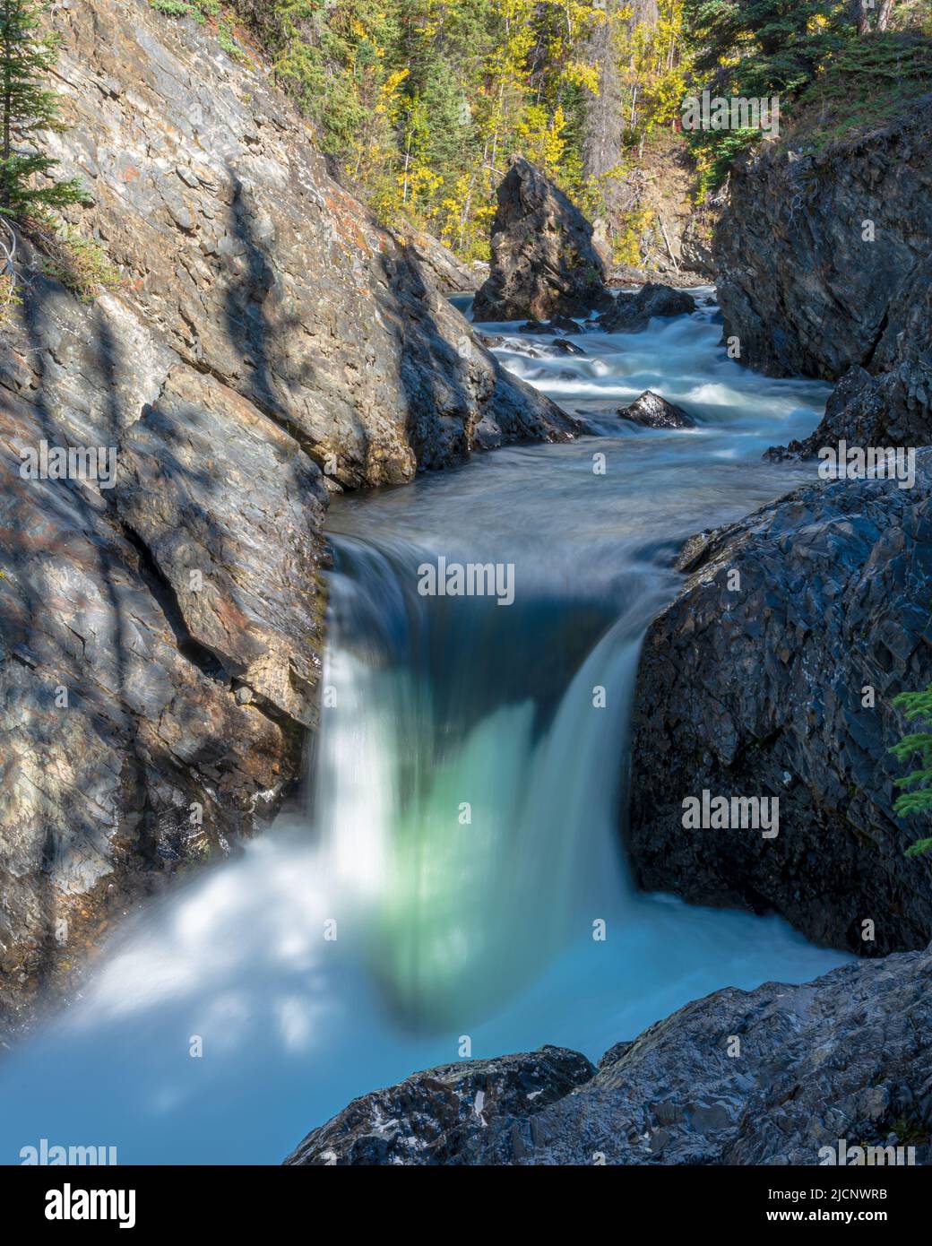 Stunning, natural waterfall in fall season from Yukon Territory, Canada ...