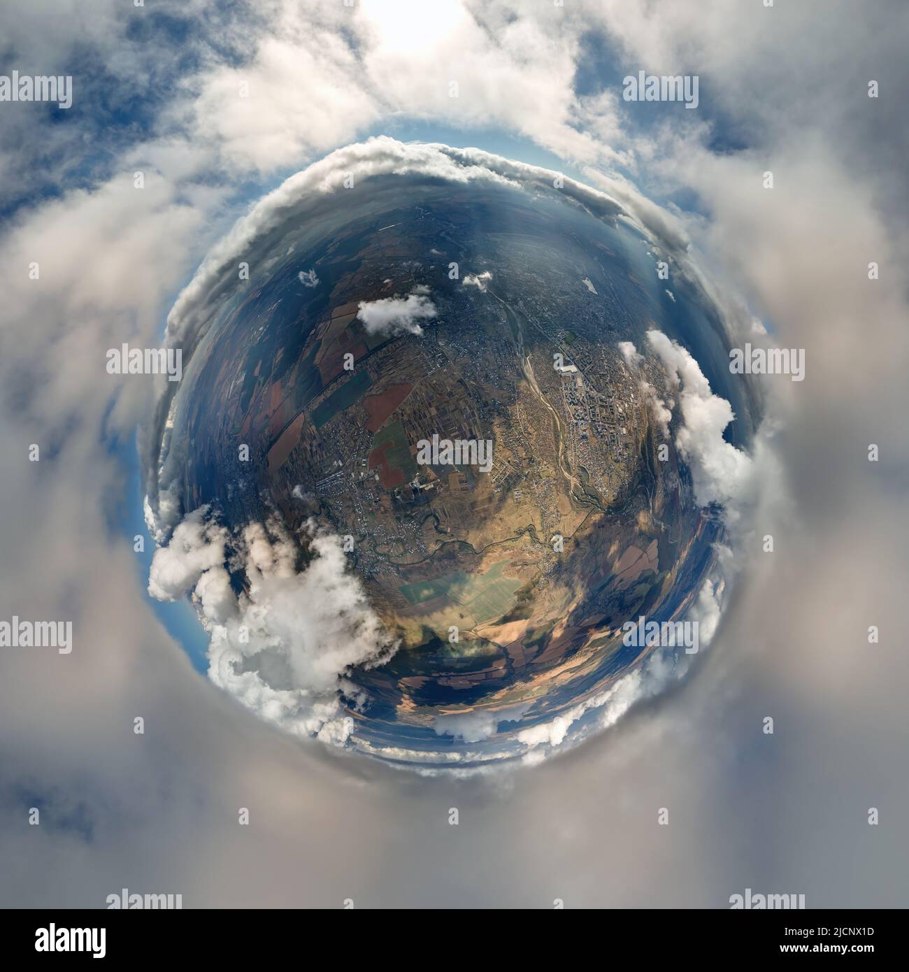 Aerial view from high altitude of little planet earth covered with ...