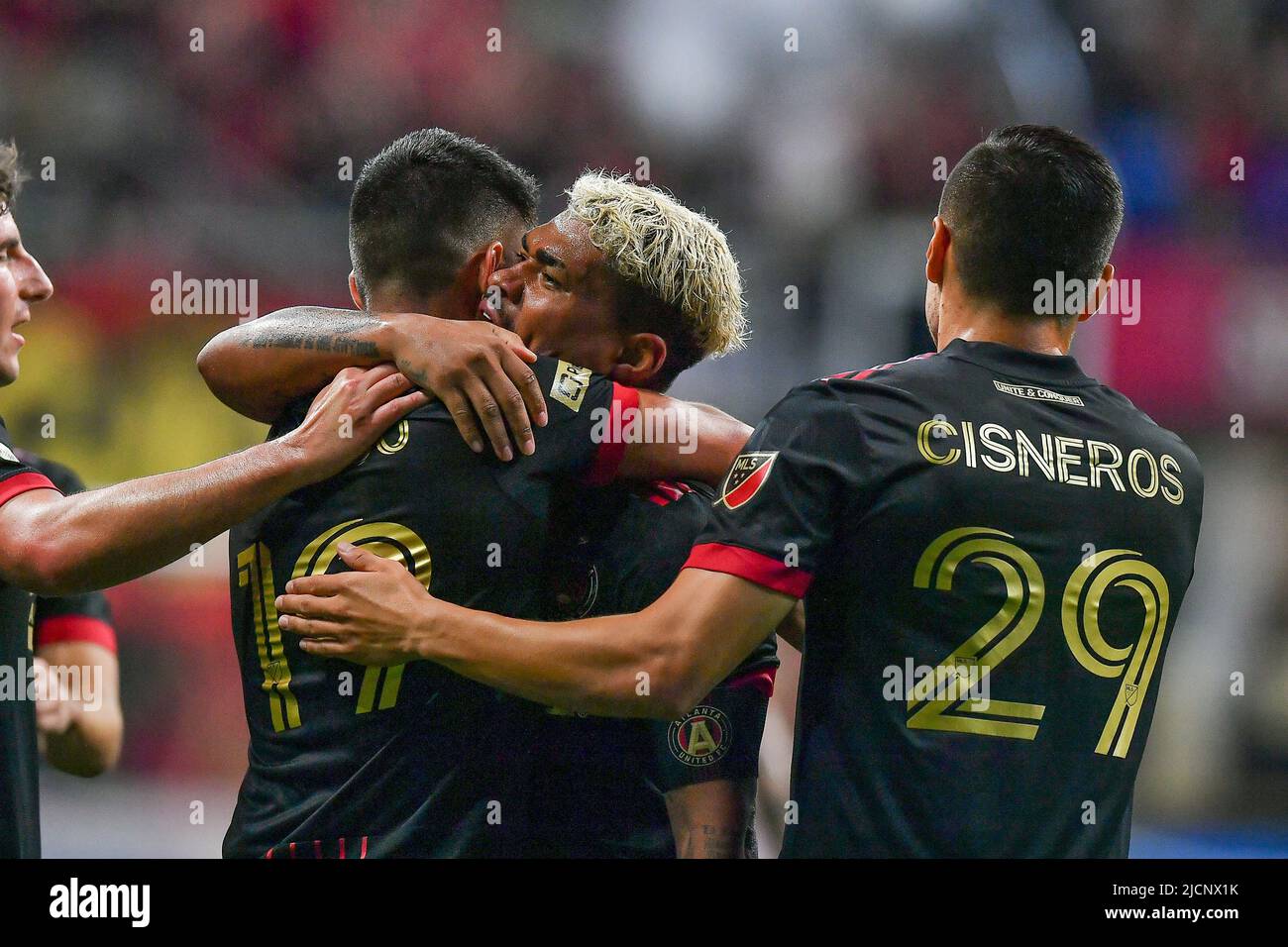 ATLANTA, GA Ã JUNE 14: Atlanta forward Josef Martâ€™nez (7) embraces ...