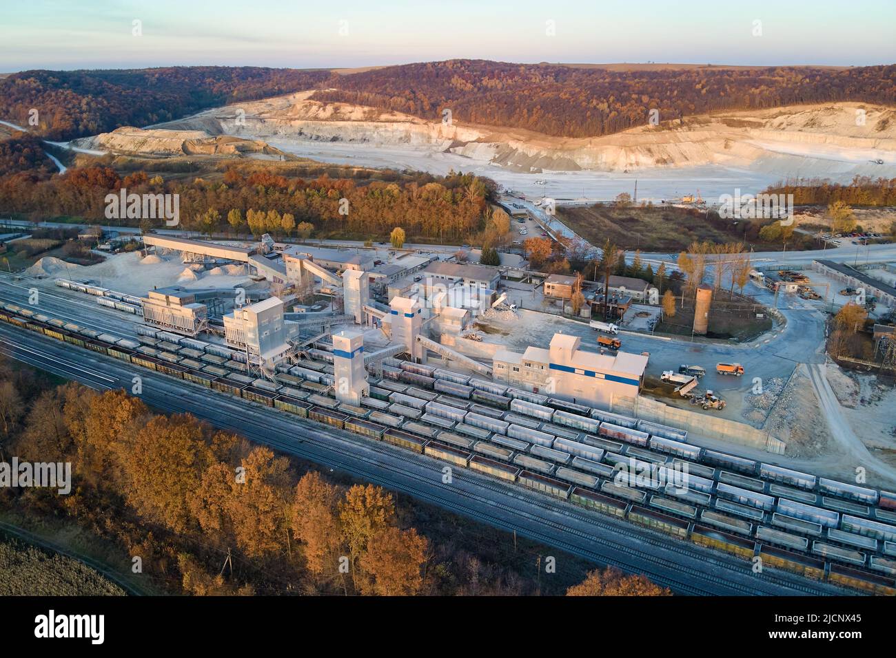 Aerial view of cargo train loaded with crushed sandstone materials at ...