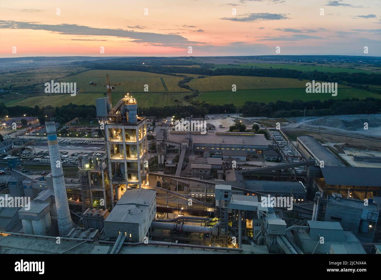 Aerial view of cement factory with high concrete plant structure and ...