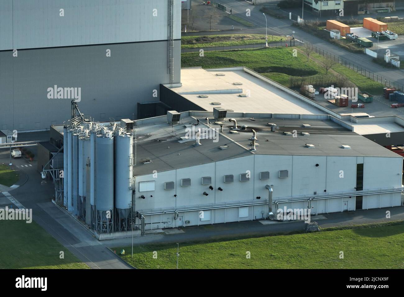 Aerial view of modern factory structure for production and distribution ...