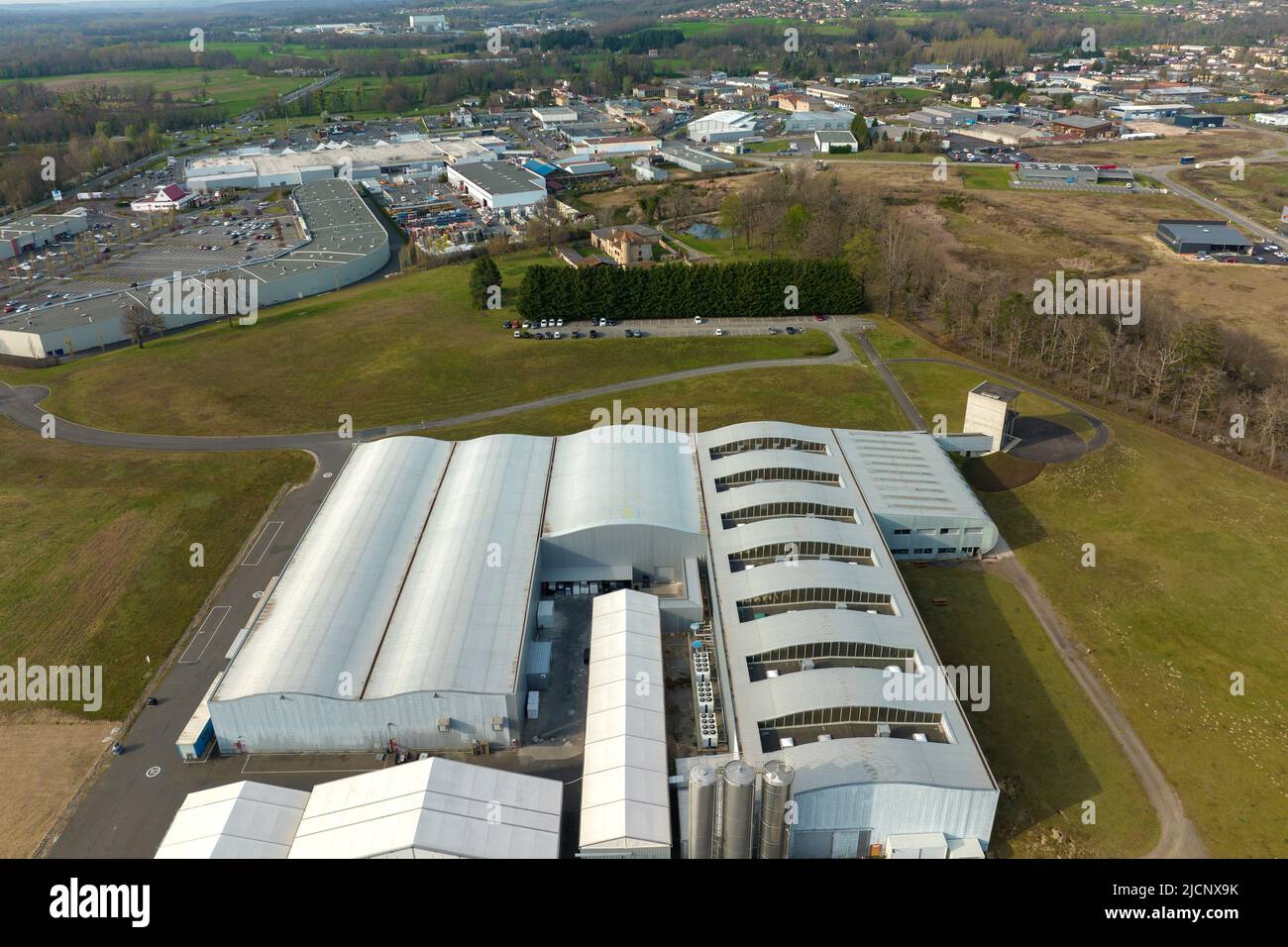 Aerial view of modern factory structure for production and distribution ...