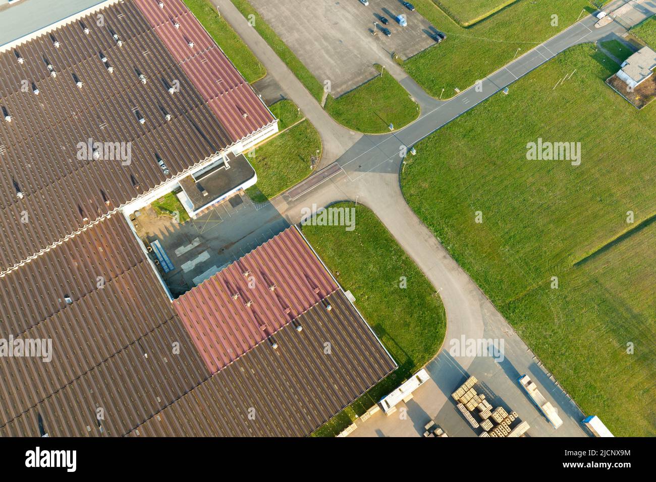 Aerial view of modern factory structure for production and distribution ...