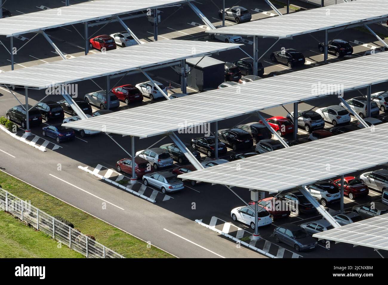 Aerial view of solar panels installed as shade roof over parking lot ...