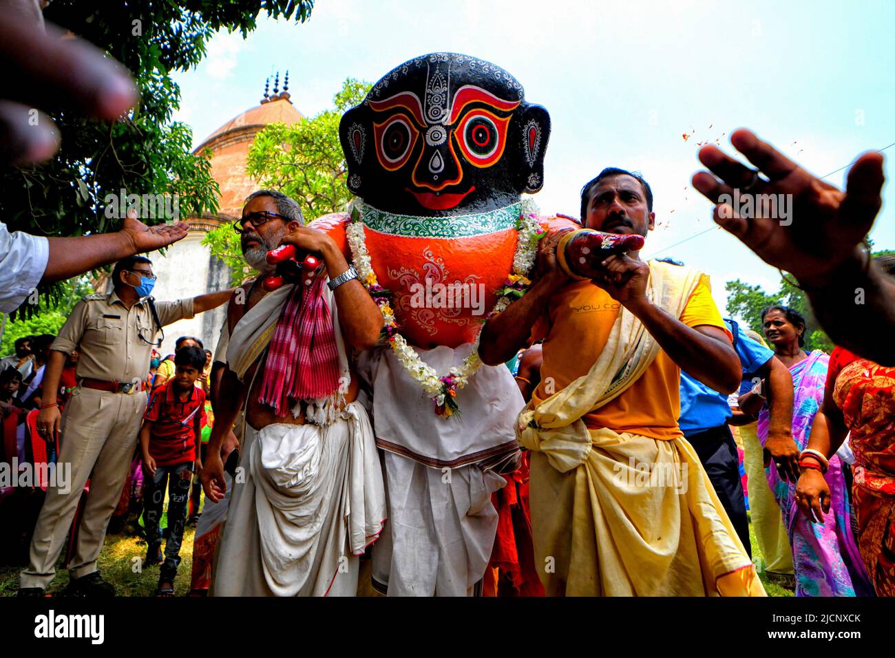 Guptipara, India. 14th June, 2022. Hindu devotees seen carrying an Idol ...