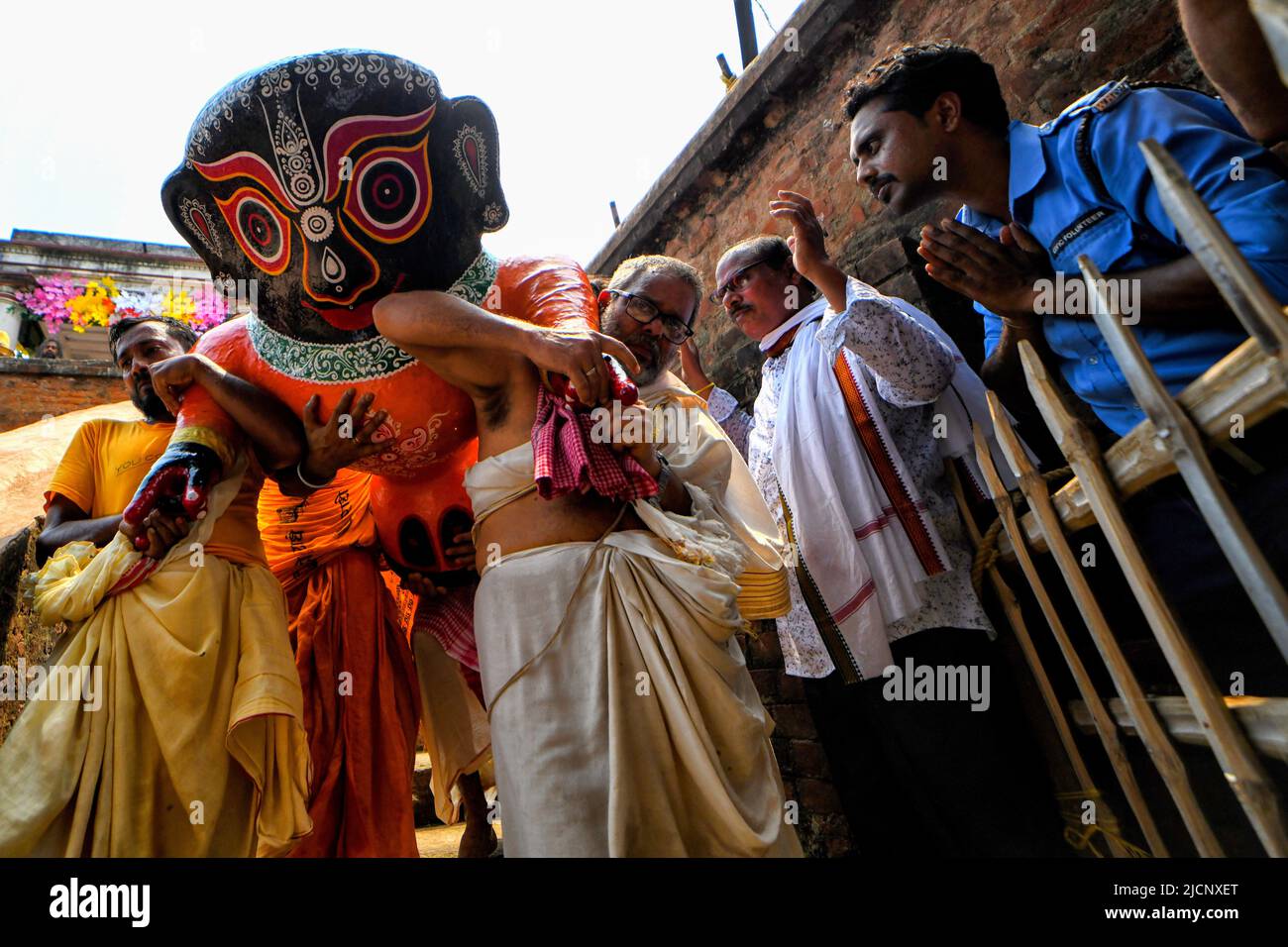 Guptipara, India. 14th June, 2022. Hindu devotees seen carrying an Idol ...
