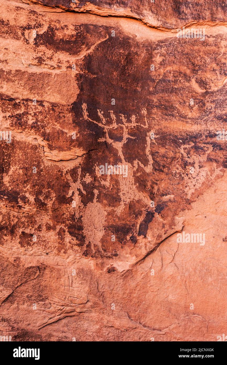 Ancestral Puebloan Native American rock art on the dark desert ...
