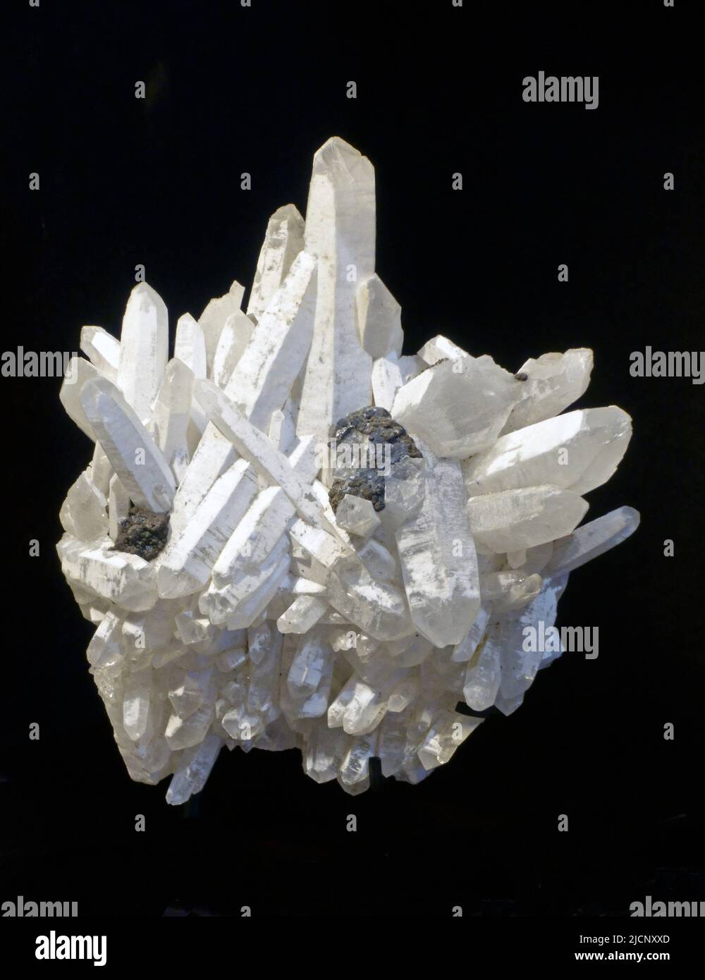 Quartz coated with silica. The clear faces of the slender prismatic ...