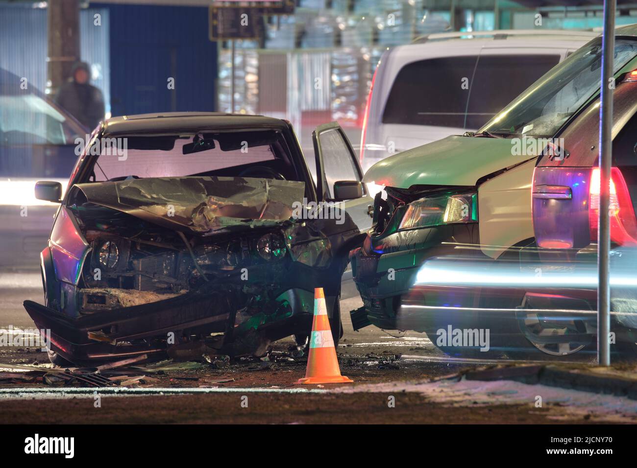 Damaged in heavy car accident vehicles after collision on city street ...