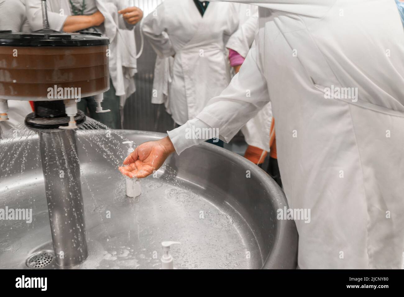 Hands wash factory hi-res stock photography and images - Alamy