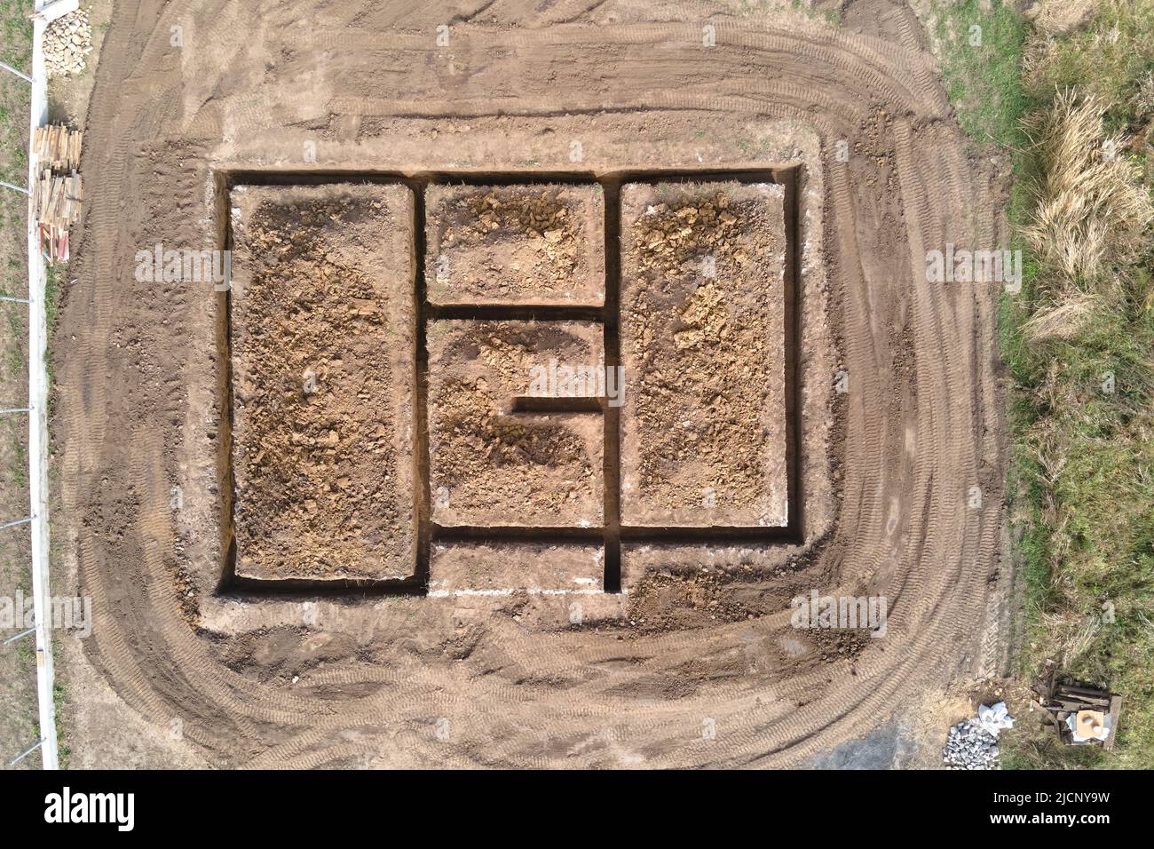 Dug out trench for building works of new house concrete foundation on ...