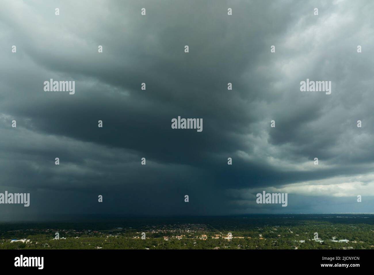 Landscape of dark ominous clouds forming on stormy sky before heavy ...
