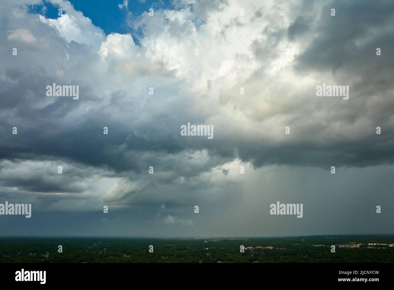 Landscape of dark ominous clouds forming on stormy sky before heavy ...