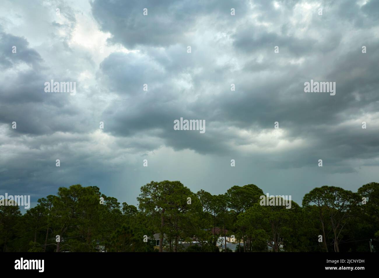 Landscape of dark ominous clouds forming on stormy sky before heavy ...