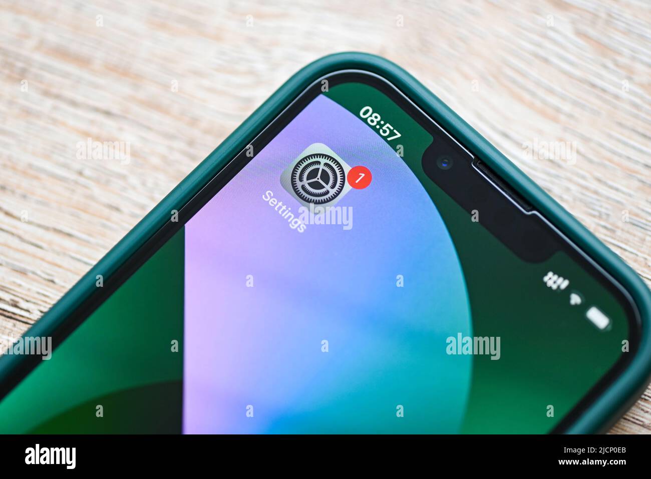 iPhone 13 Pro with notification software update on settings app iOS 15. ...