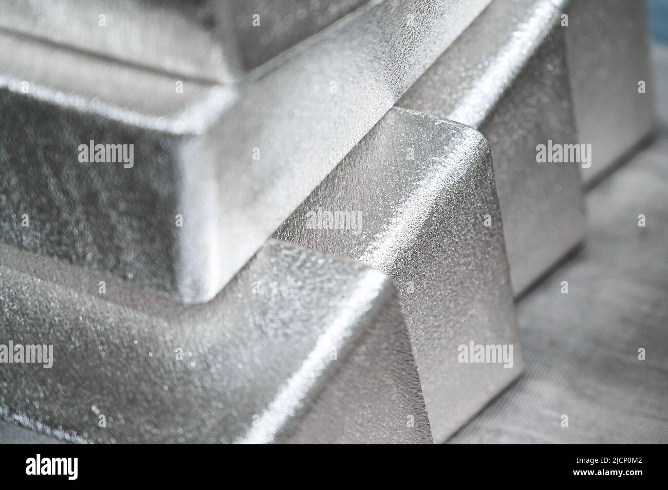 Stack of industrial silver ingots at bright light in storage Stock ...