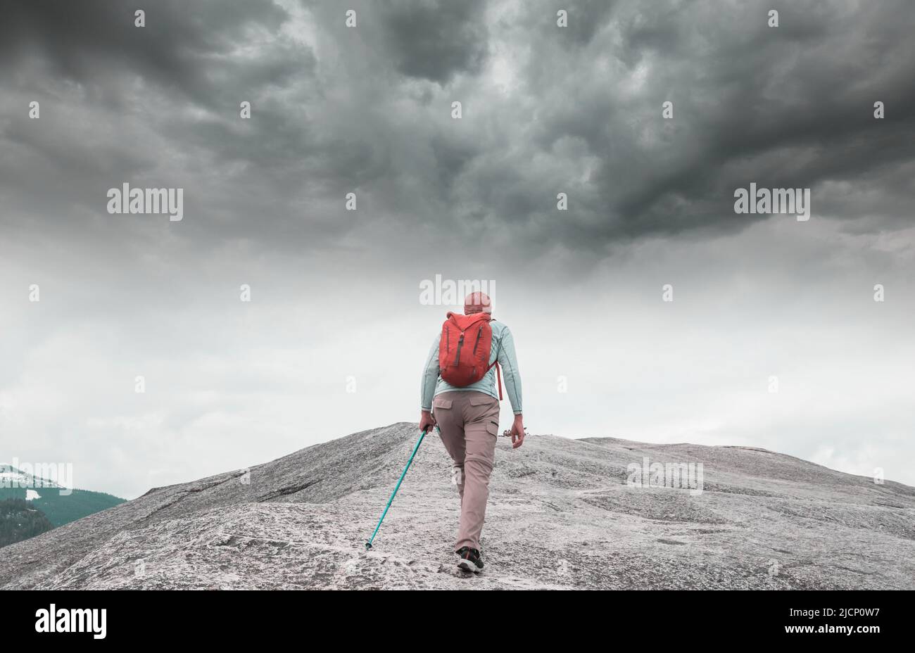 Backpacker in hike in the high mountains Stock Photo - Alamy