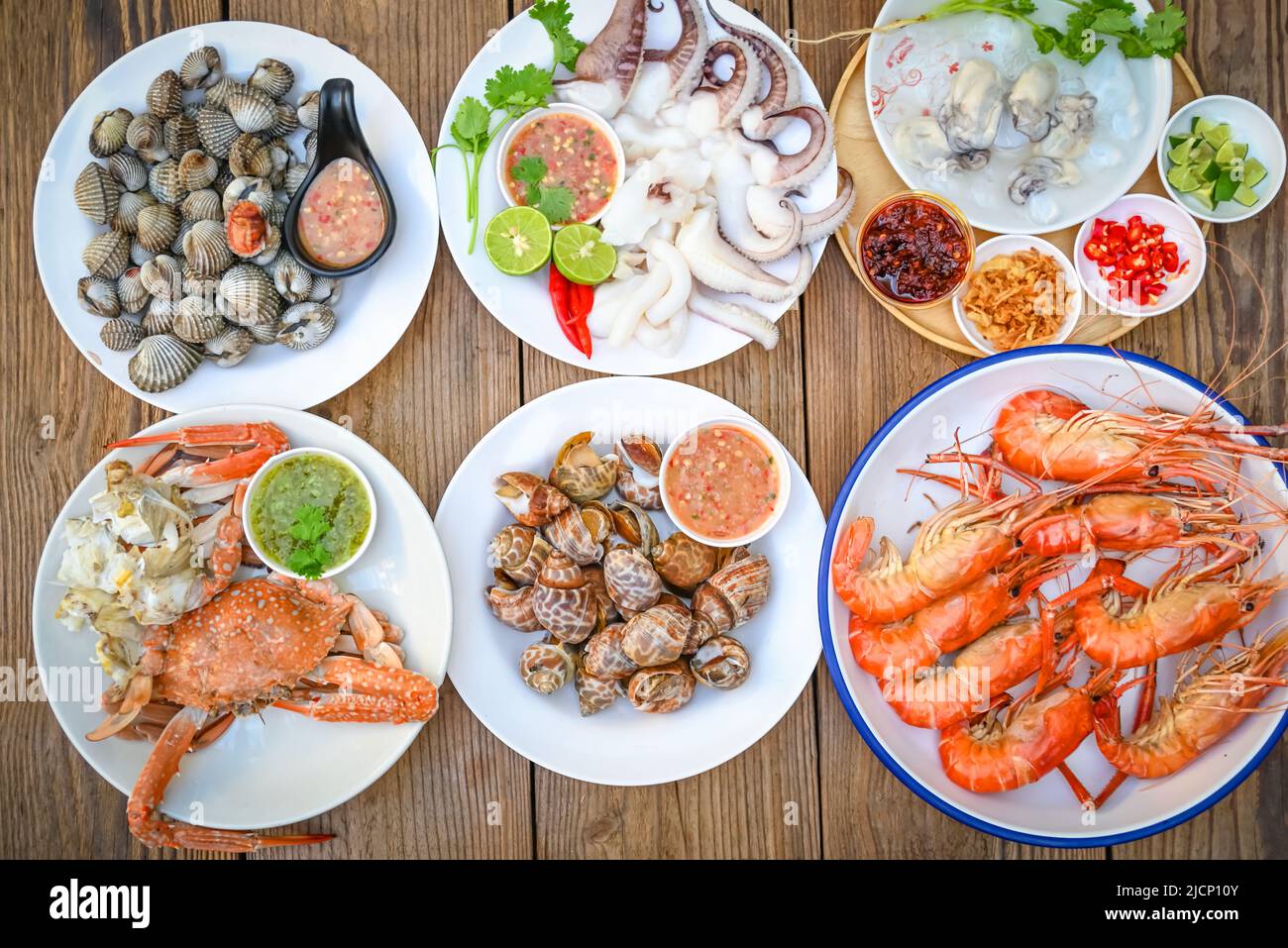 seafood plate with shrimp shellfish crab squid cockle spotted babylon ...