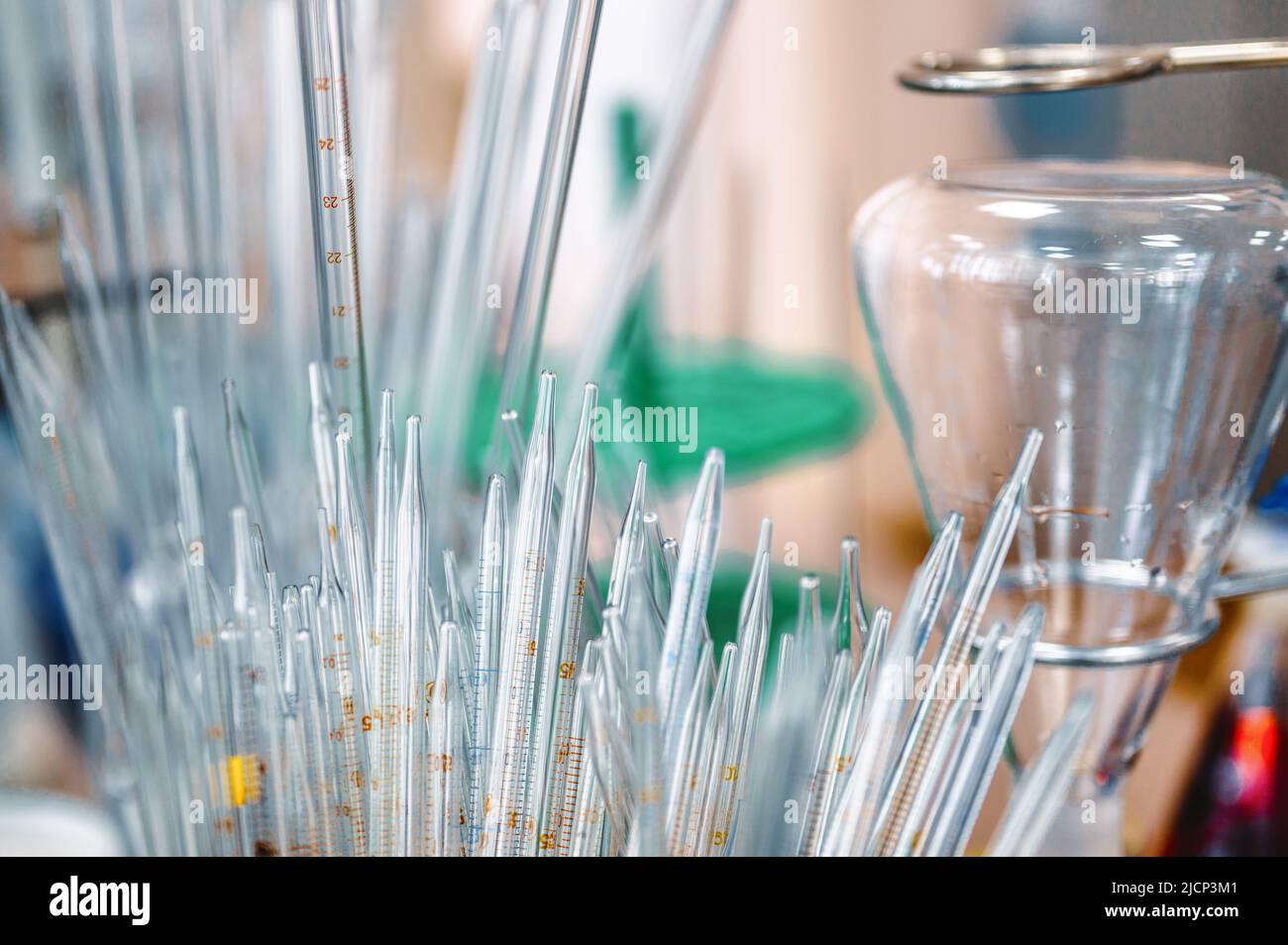 Bunch of glass pipettes with samples of alcohol drinks Stock Photo - Alamy