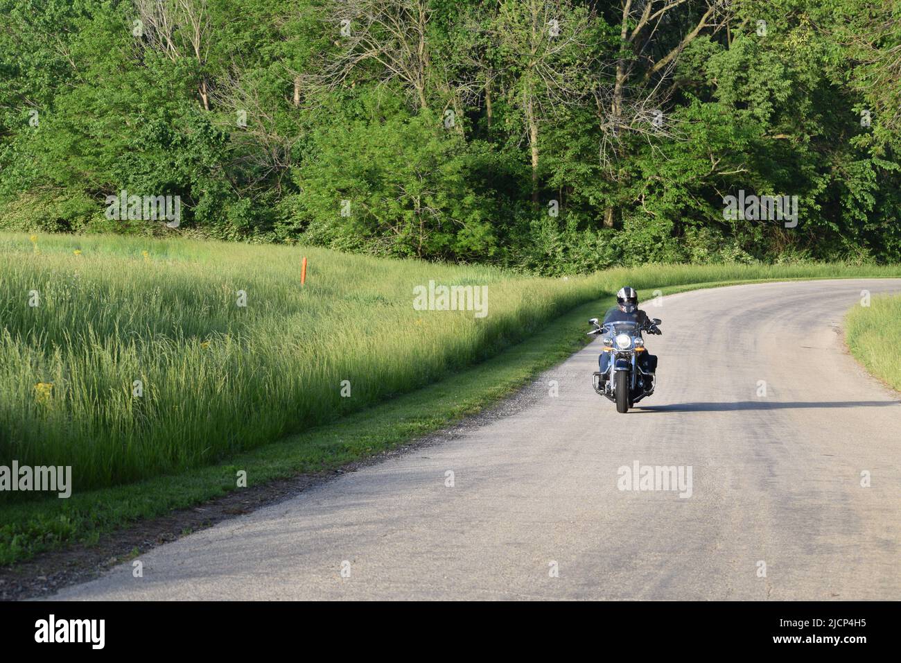 Motorcycle on small road hi-res stock photography and images - Alamy