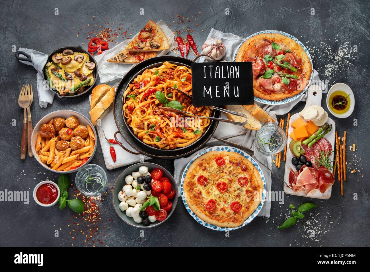 Italian food assortment on dark background. Traditional food concept ...