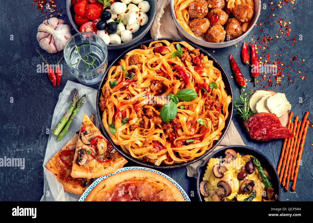 Italian food assortment on dark background. Traditional food concept ...