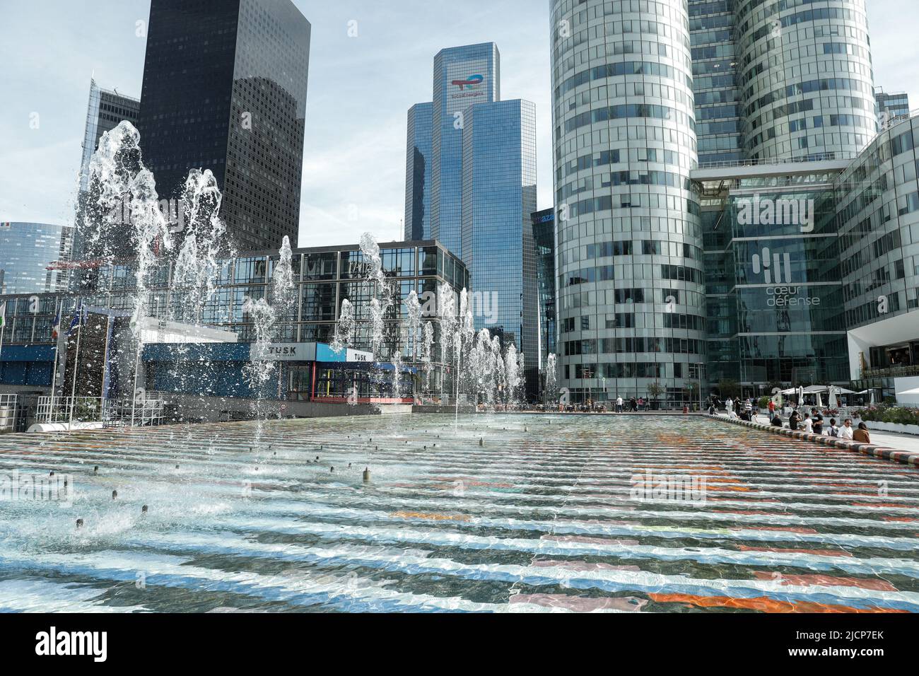Illustration of fountains in the business district in La Defense. This ...