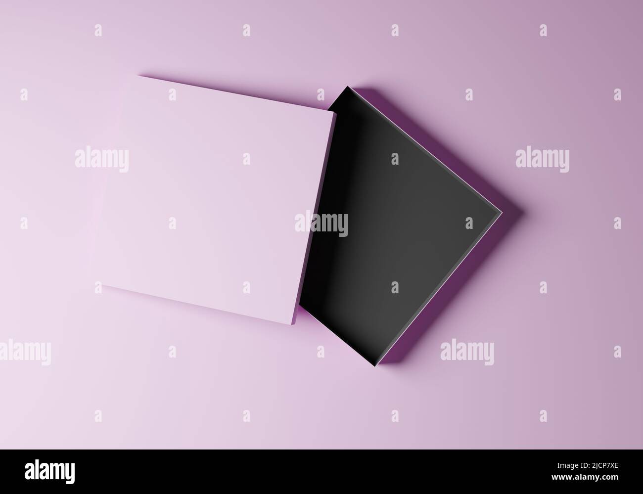 Open light pink gift box or package on a light pink background, mock up ...