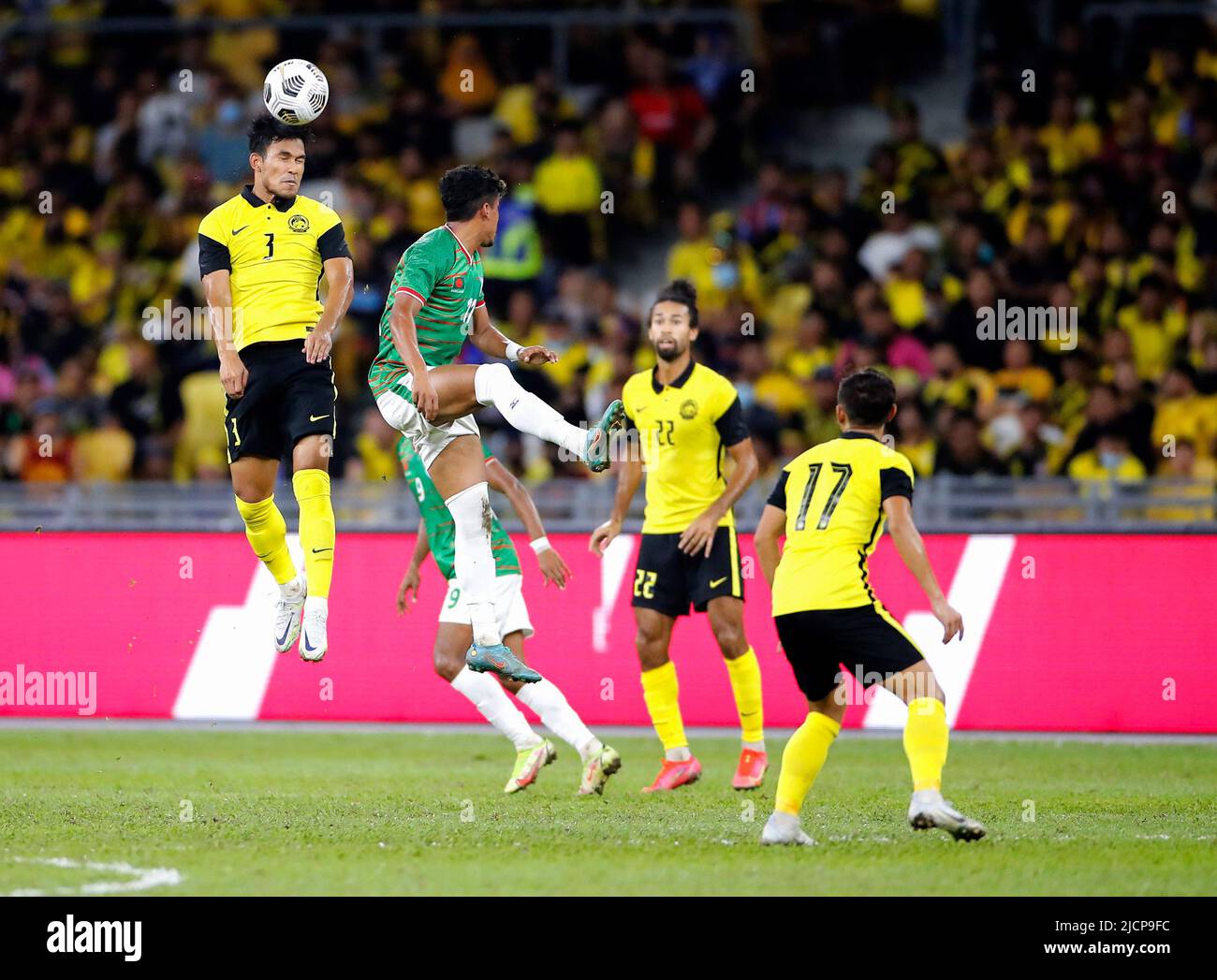 Shahrul Mohd Saad (L) of Malaysia and Rakib Hossain (L2) of Bangladesh ...