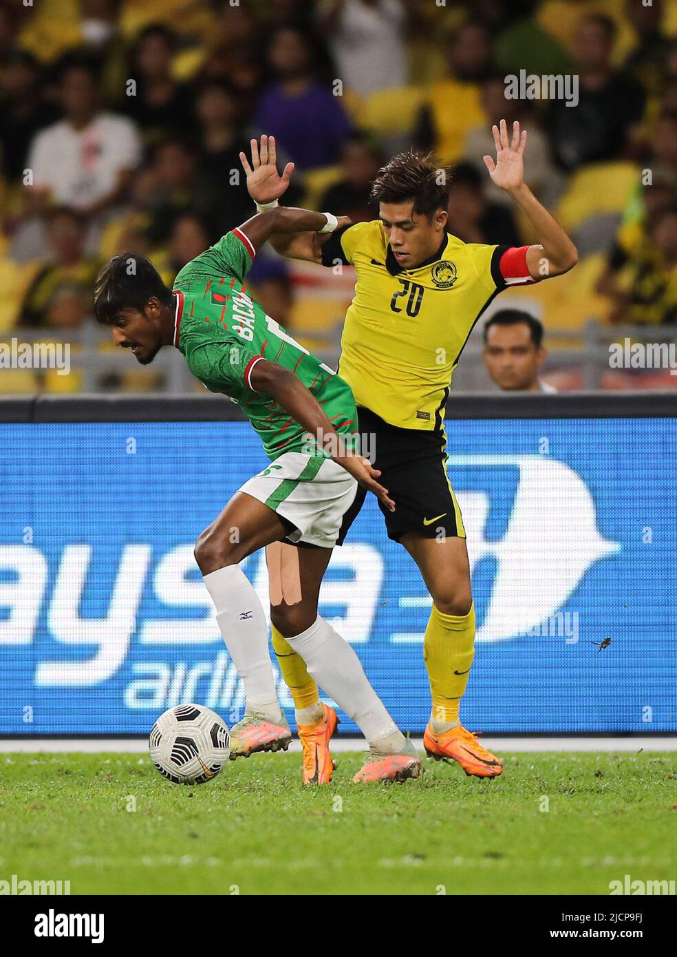 Muhammad Syafiq Ahmad (R) of Malaysia and Md Tutul Badsha (L) of ...