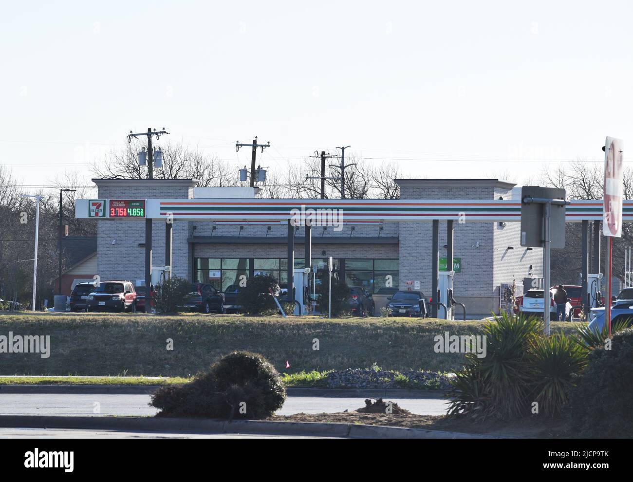 Distant view of a 7-11 convenience store with gas pumps Stock Photo - Alamy