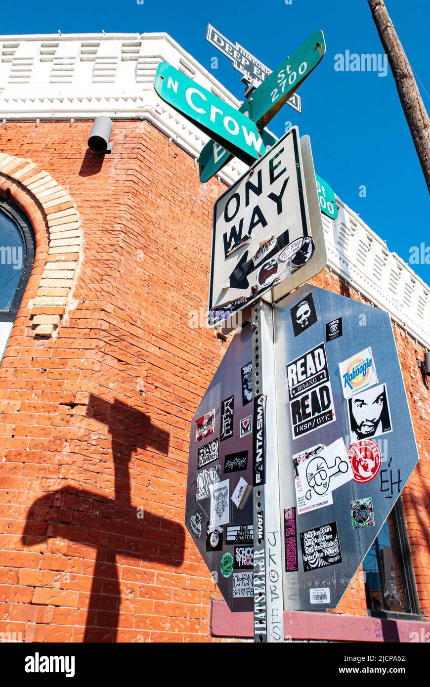 Deep Ellum Area of Dallas, Texas: Stickers adorn the back of a stop ...