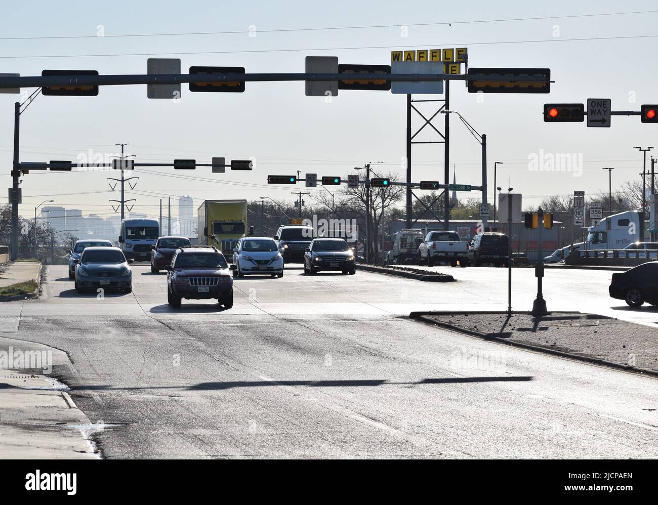 Rush hour traffic on a busy street during morning rush hour traffic ...