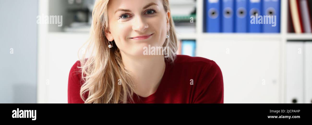Beautiful young woman office worker posing in personal cabinet Stock ...