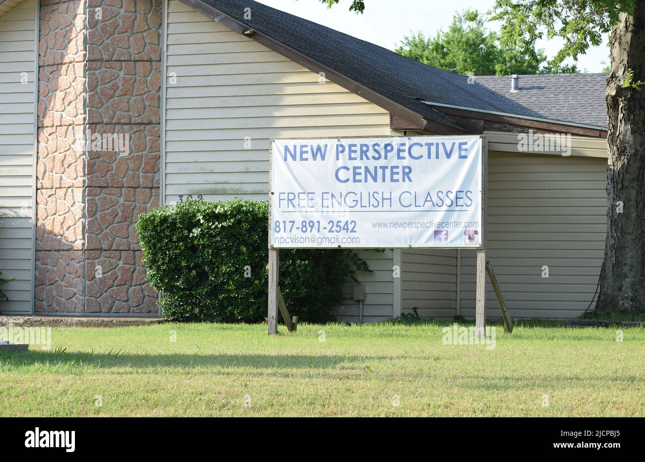 Sign for New Perspective Center advertising free English classes Stock ...