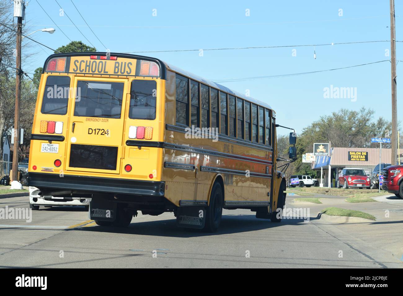 School bus turning left on a street in Irving, Texas Stock Photo - Alamy