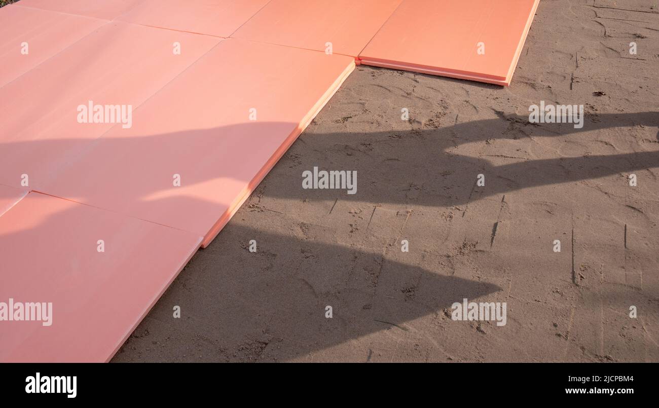 The polyplex polystyrene slab is laid on wet sand as insulation for the ...