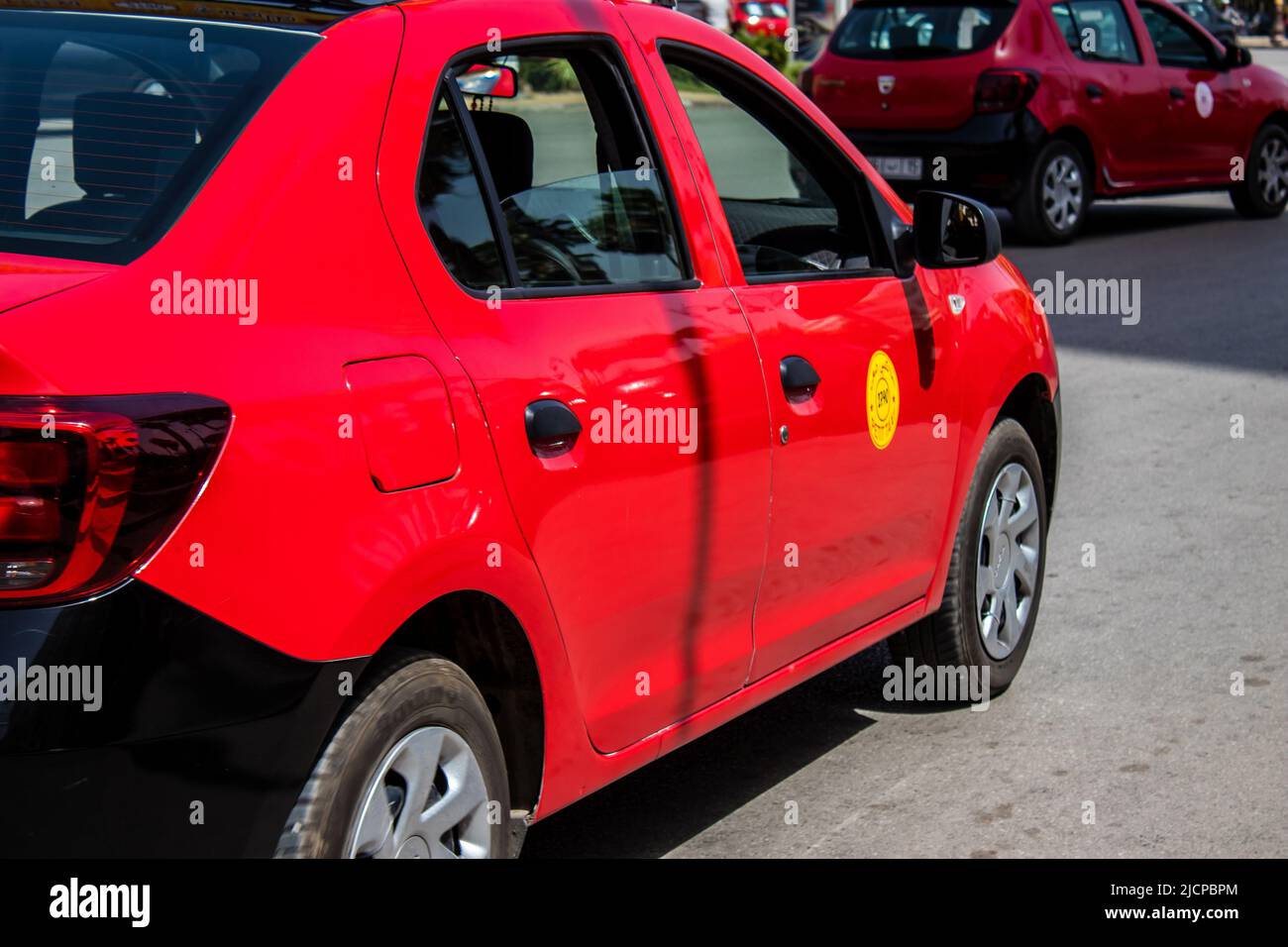 Fez, Morocco - June 14, 2022 Taxi driving through the streets of Fez ...