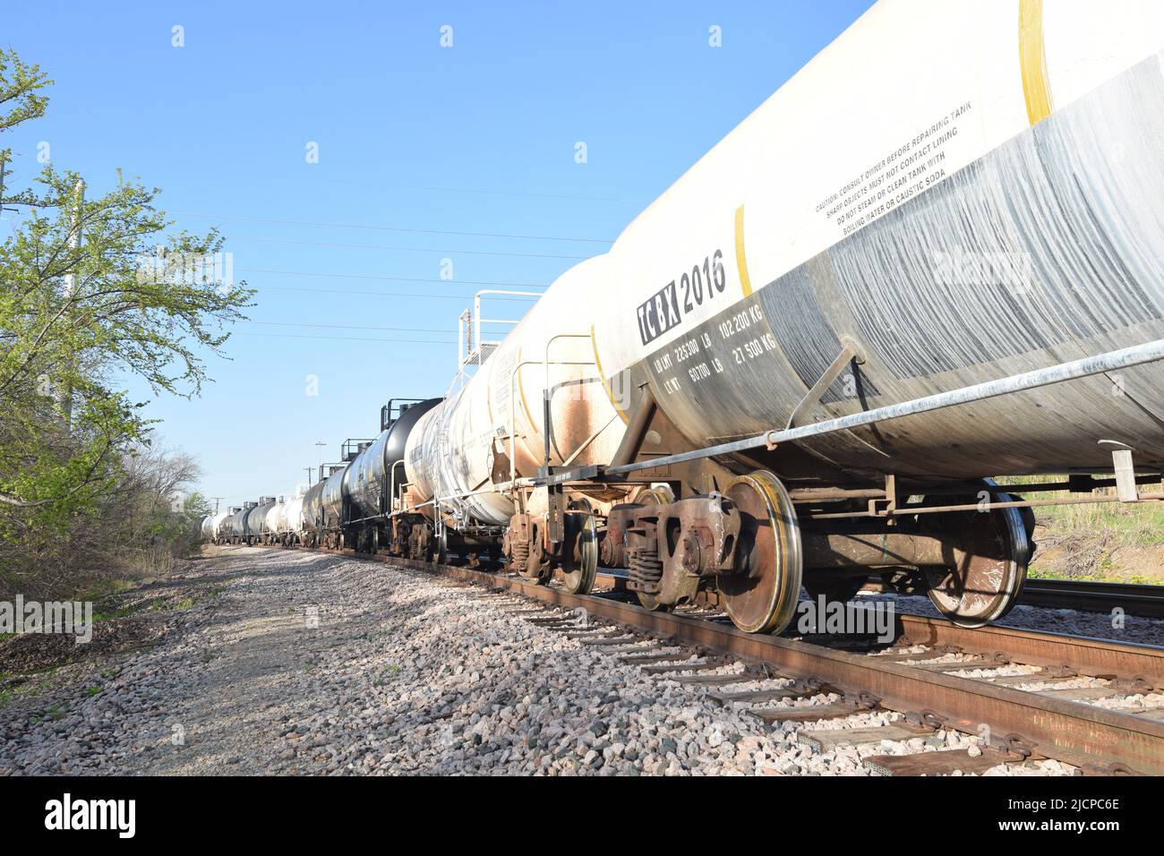 Tanker cars of a parked railroad train on railroad tracks near the Las ...